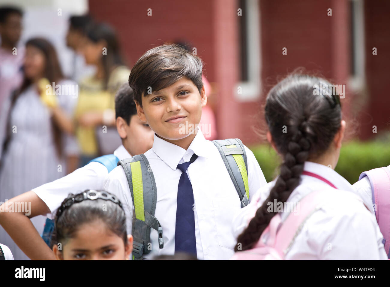 Group of schoolboys and schoolgirls at school campus Stock Photo - Alamy