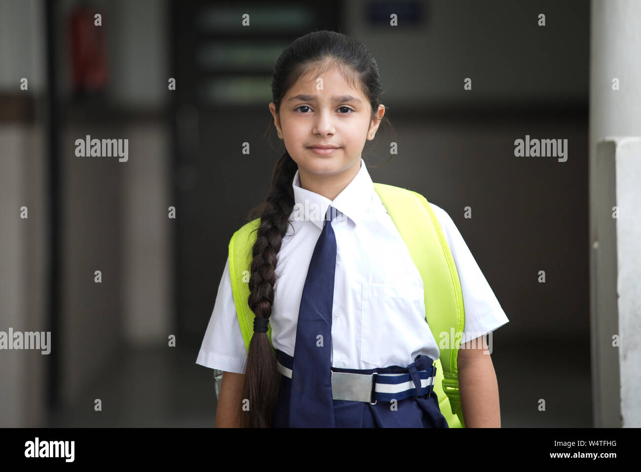 School girl smiling uniform hi-res stock photography and images - Alamy