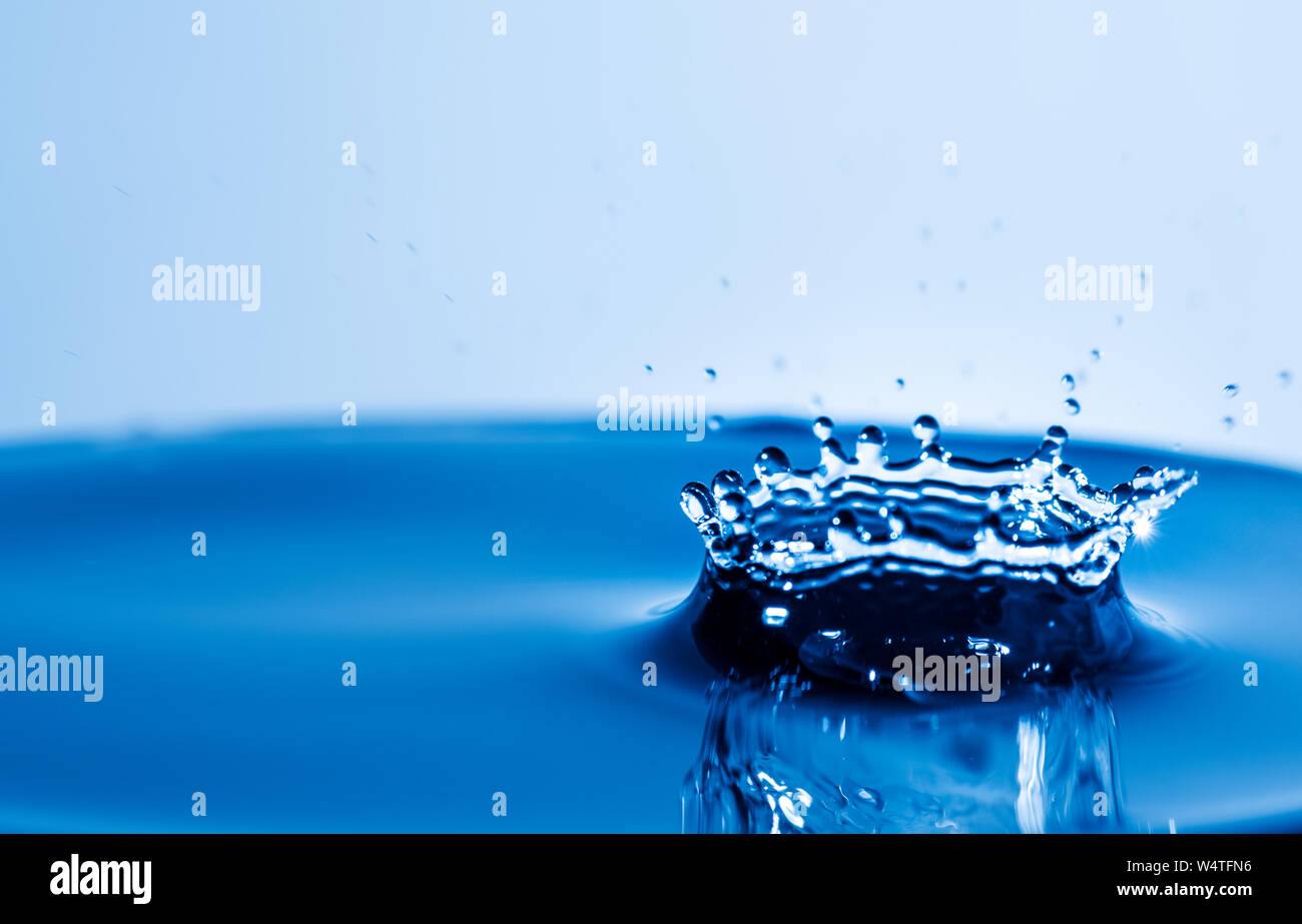 Water splash,water splash isolated on dark background Stock Photo - Alamy