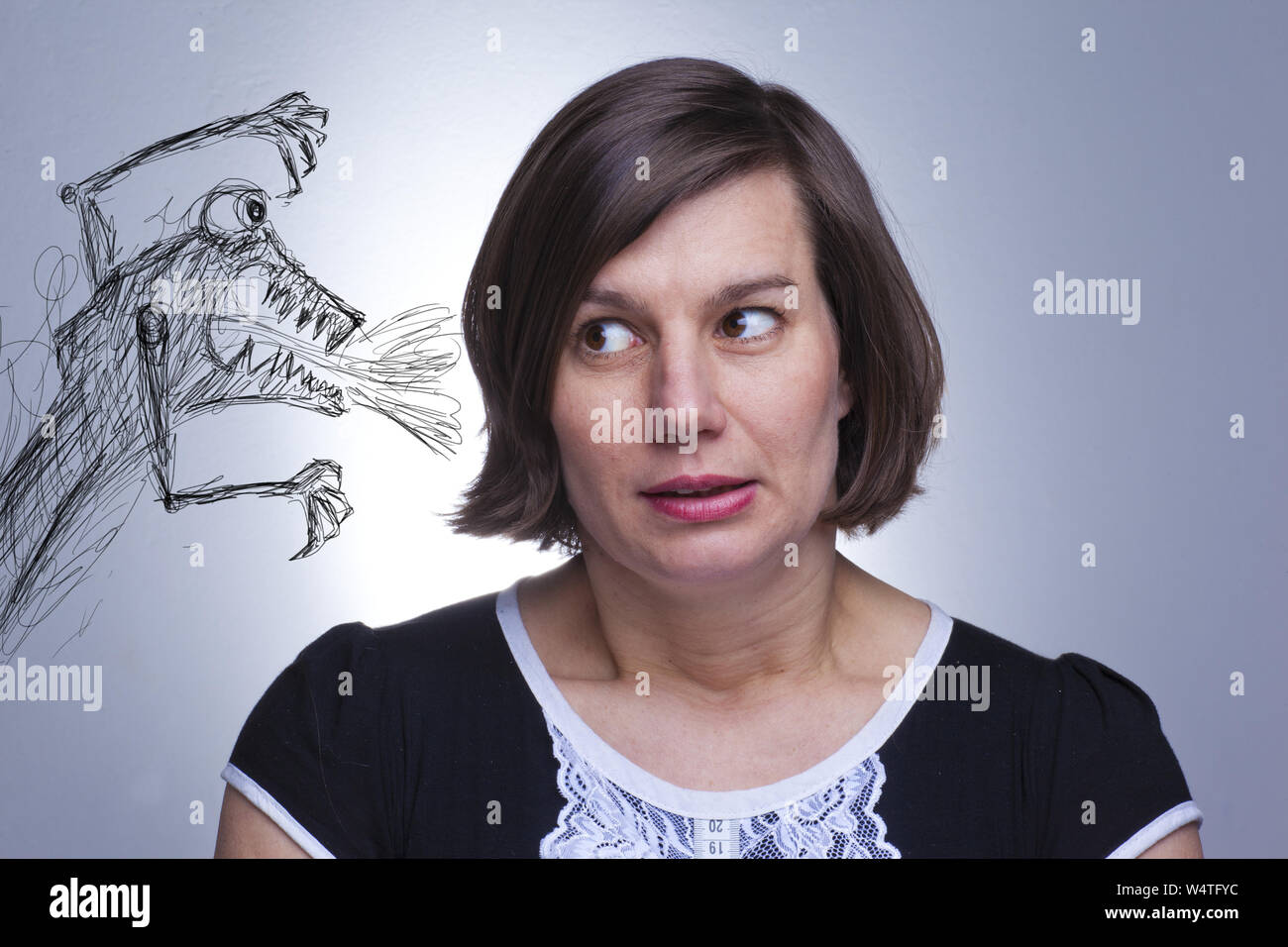 Woman is afraid of Ghosts at the wall. Fear concept Stock Photo - Alamy