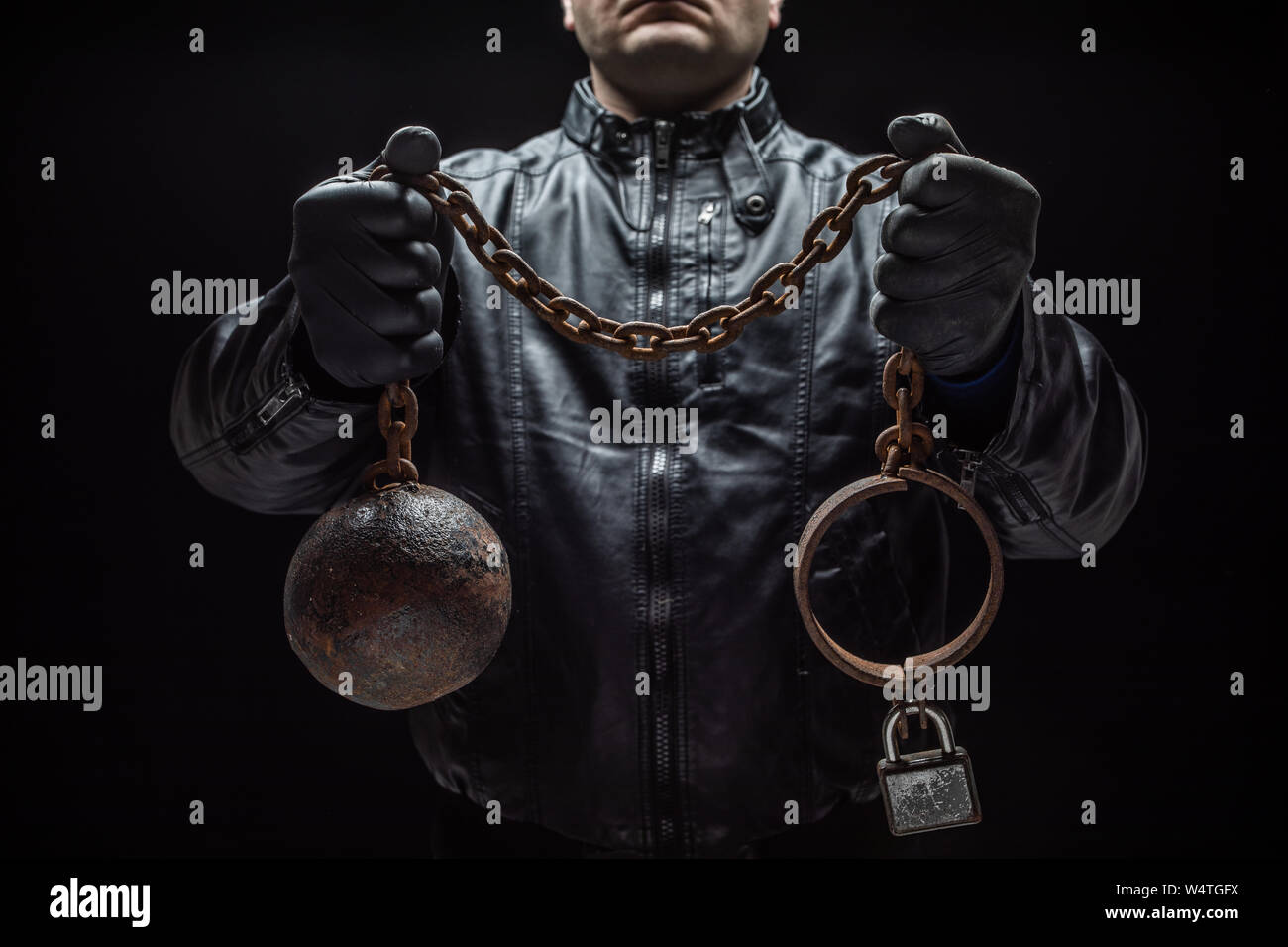 Serial killer with chains for his victim / heloween concept Stock Photo ...