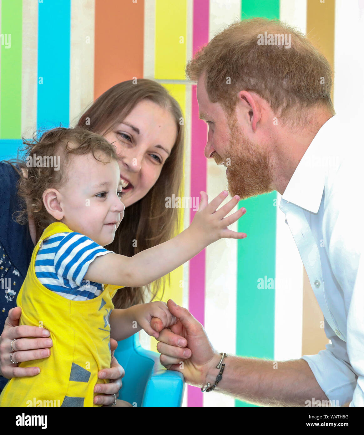 The Duke of Sussex plays with one year old Noah Nicholson during his ...
