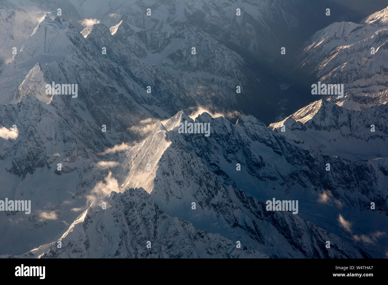 China, Tibet, Hengduan Mountains , Snowy mountains separate the Tibetan ...