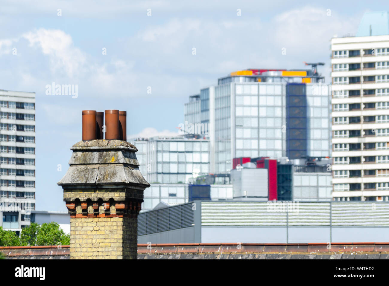 Typical English chimneys on the roofs of London buildings, an element ...