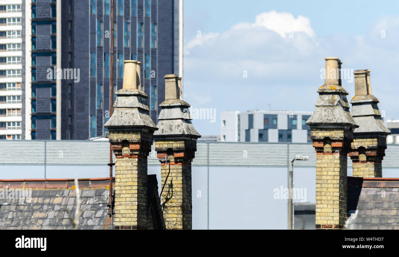 Typical English chimneys on the roofs of London buildings, an element ...