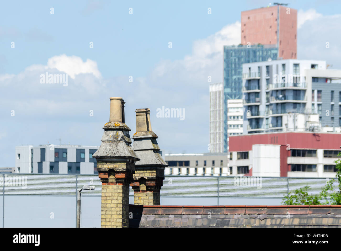 Typical English chimneys on the roofs of London buildings, an element ...