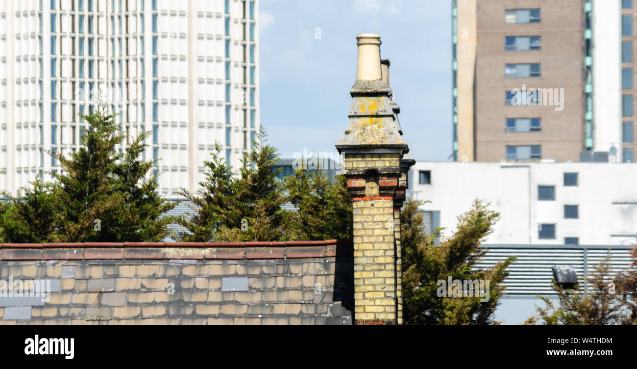 Typical English chimneys on the roofs of London buildings, an element ...