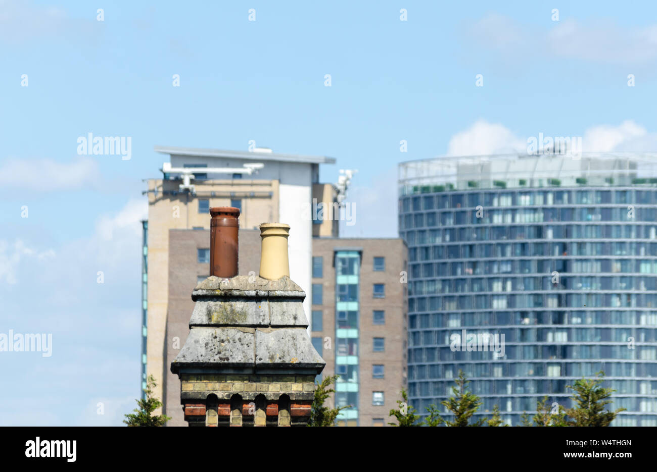 Typical English chimneys on the roofs of London buildings, an element ...