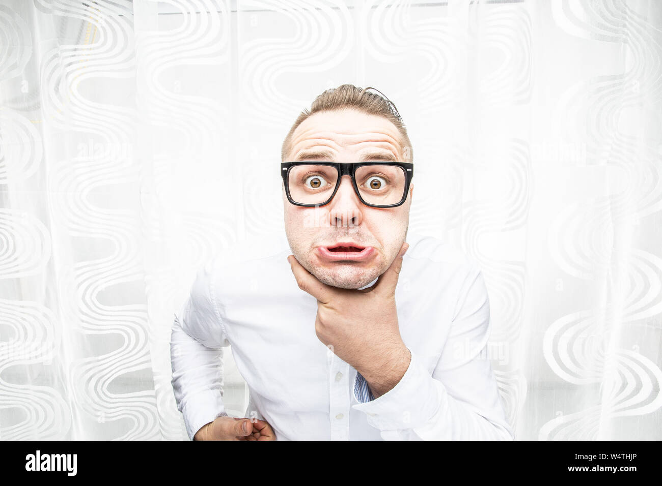 Man can not decide and is trapped Stock Photo - Alamy