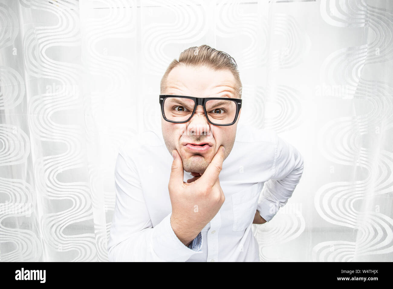 Man can not decide and is trapped Stock Photo - Alamy