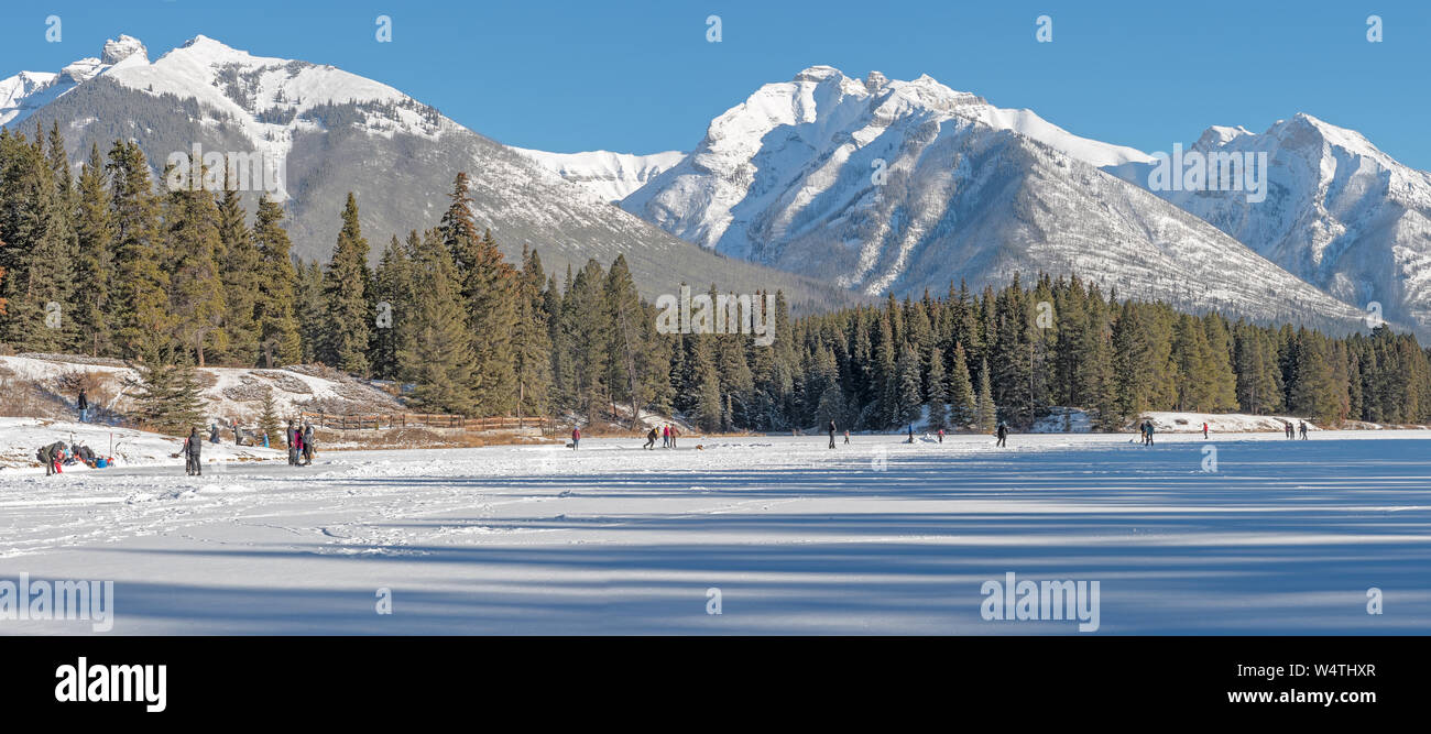 Ice Skating on Johnson Lake in Banff National Park in Alberta, Canada ...