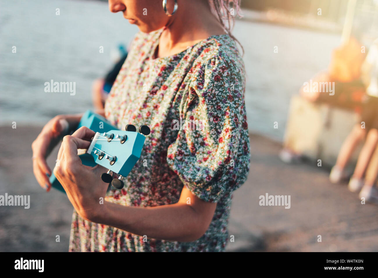 Girl singer sunset hi-res stock photography and images - Alamy