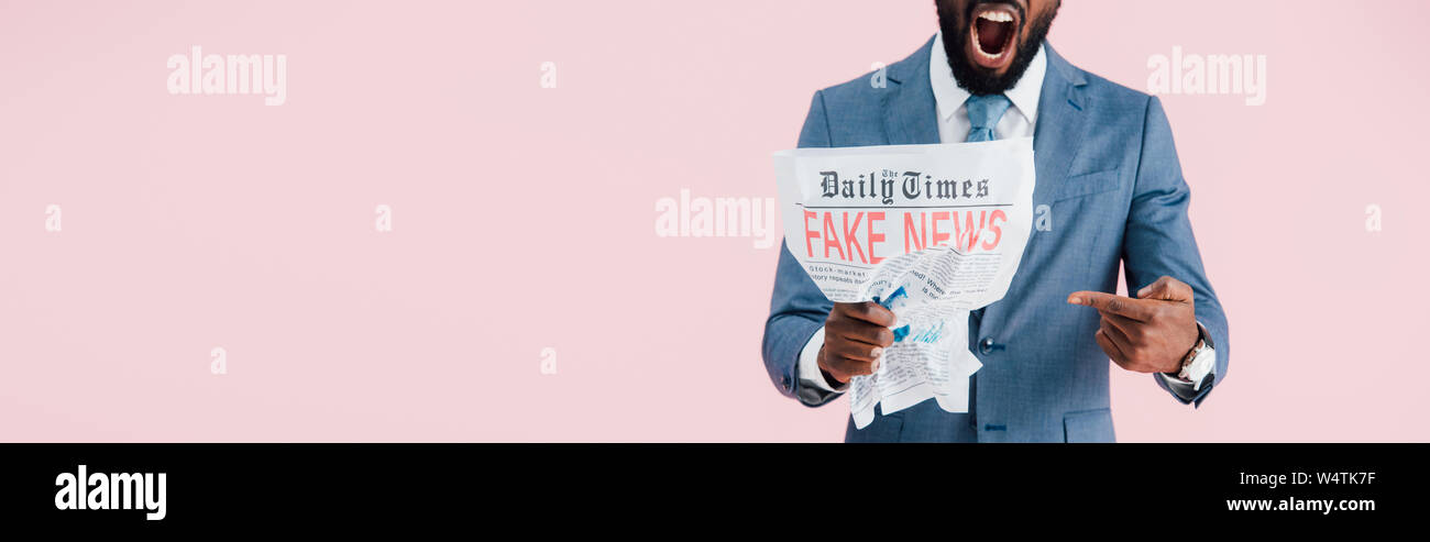 cropped view of angry african american businessman screaming and ...