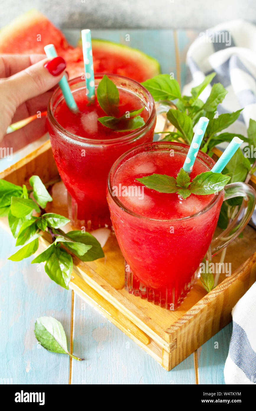 Cold Watermelon Smoothie. Summer Watermelon drink in glasses and slices ...
