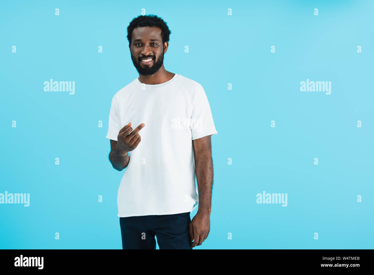 happy african american man showing middle finger isolated on blue Stock ...