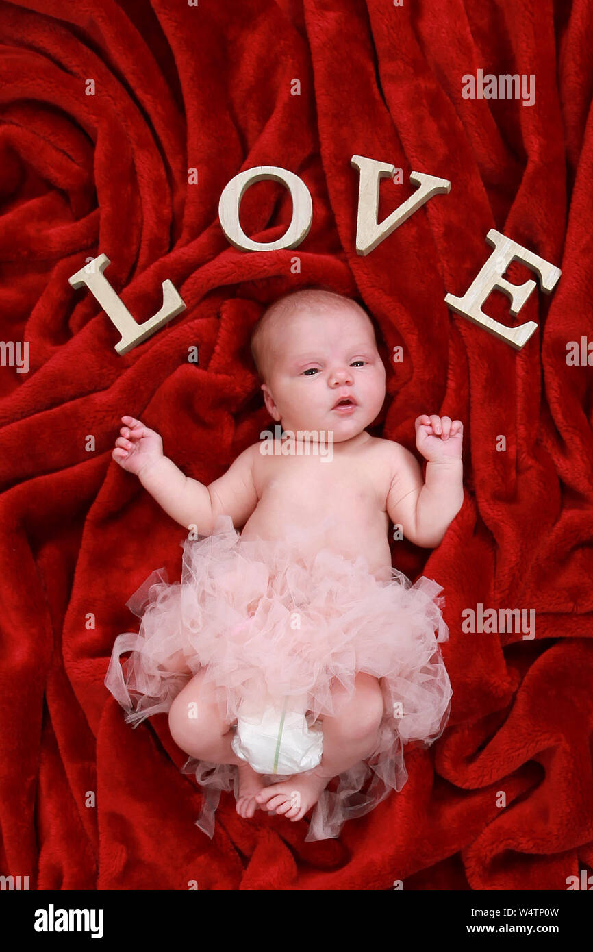 1 week old baby girl Stock Photo - Alamy