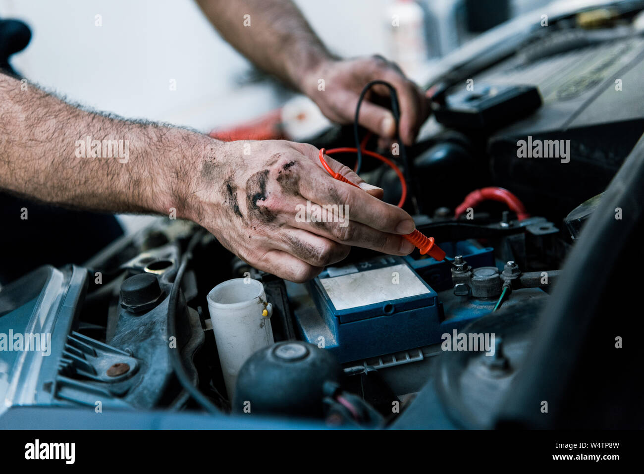 Hands fixing hi-res stock photography and images - Alamy