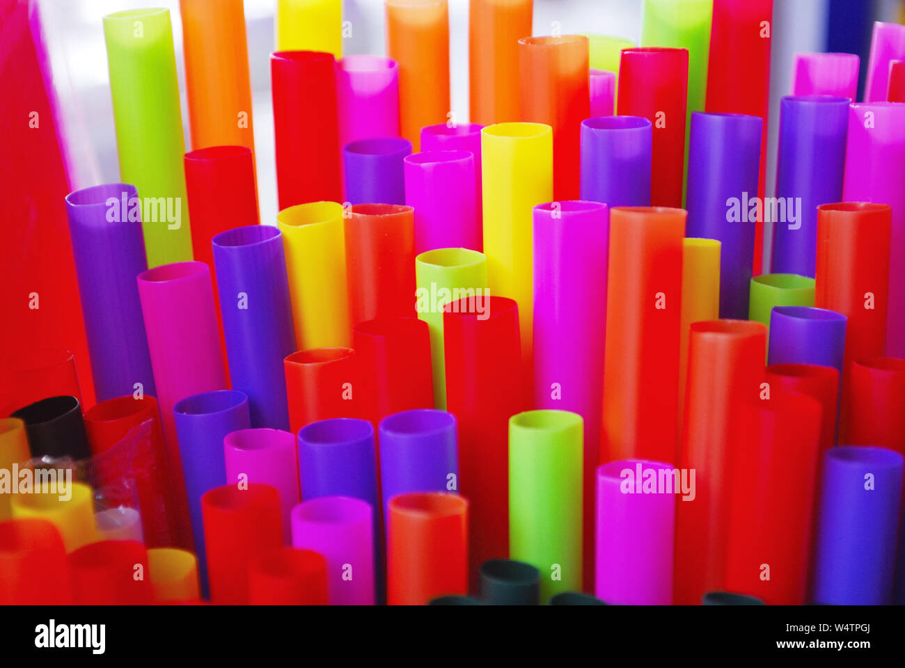 Plastic tubes with many colors such as yellow, orange, red Stock Photo ...