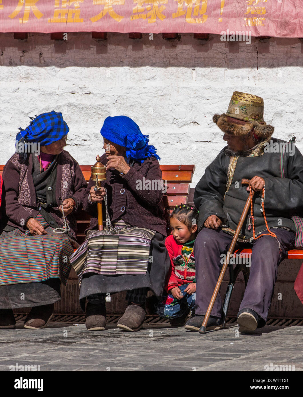 China, Tibet, Lhasa, Tibetan Buddhist pilgrims from the Kham region of ...