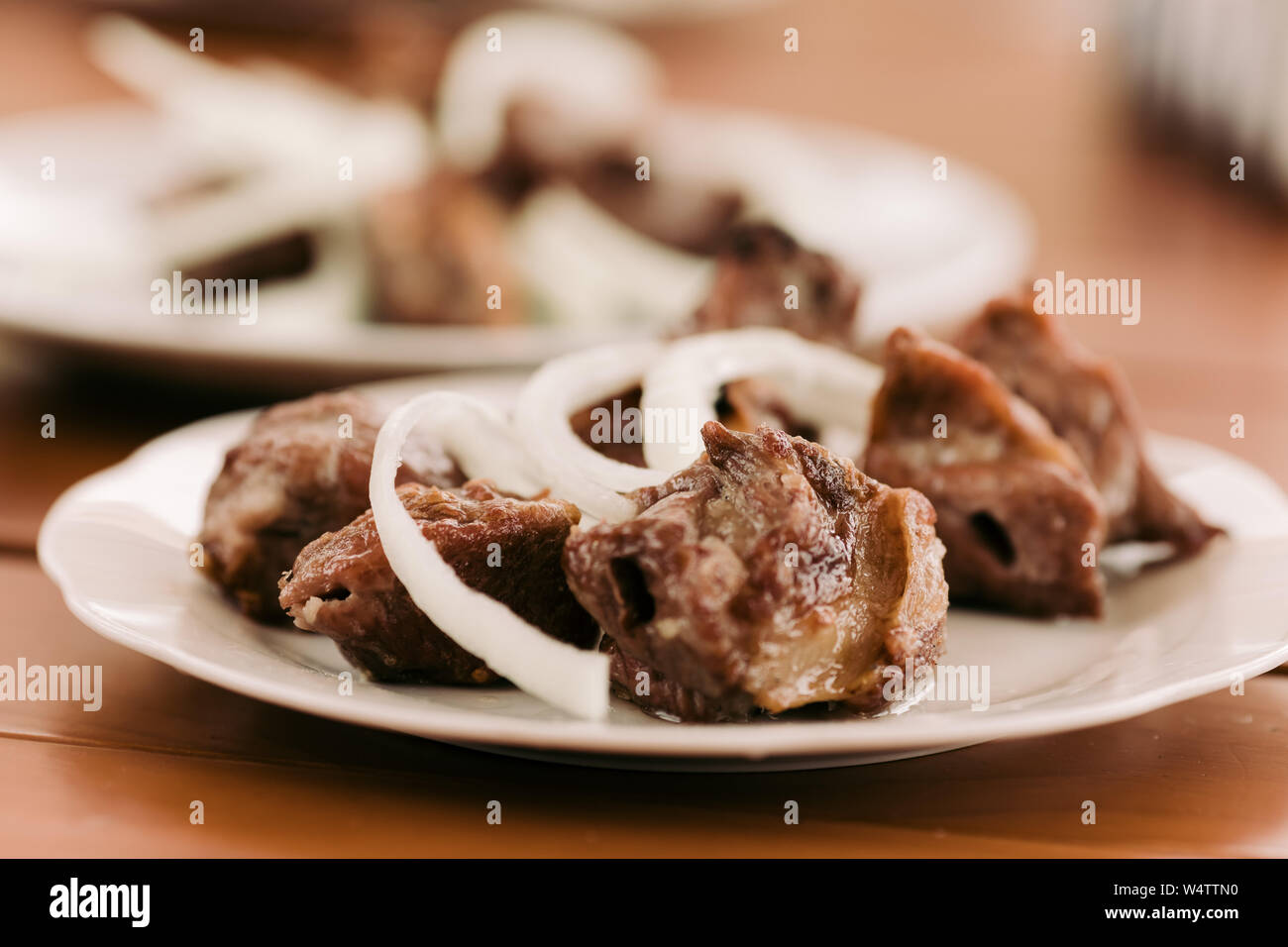 pork shish kebab or shashlik on plate Stock Photo - Alamy