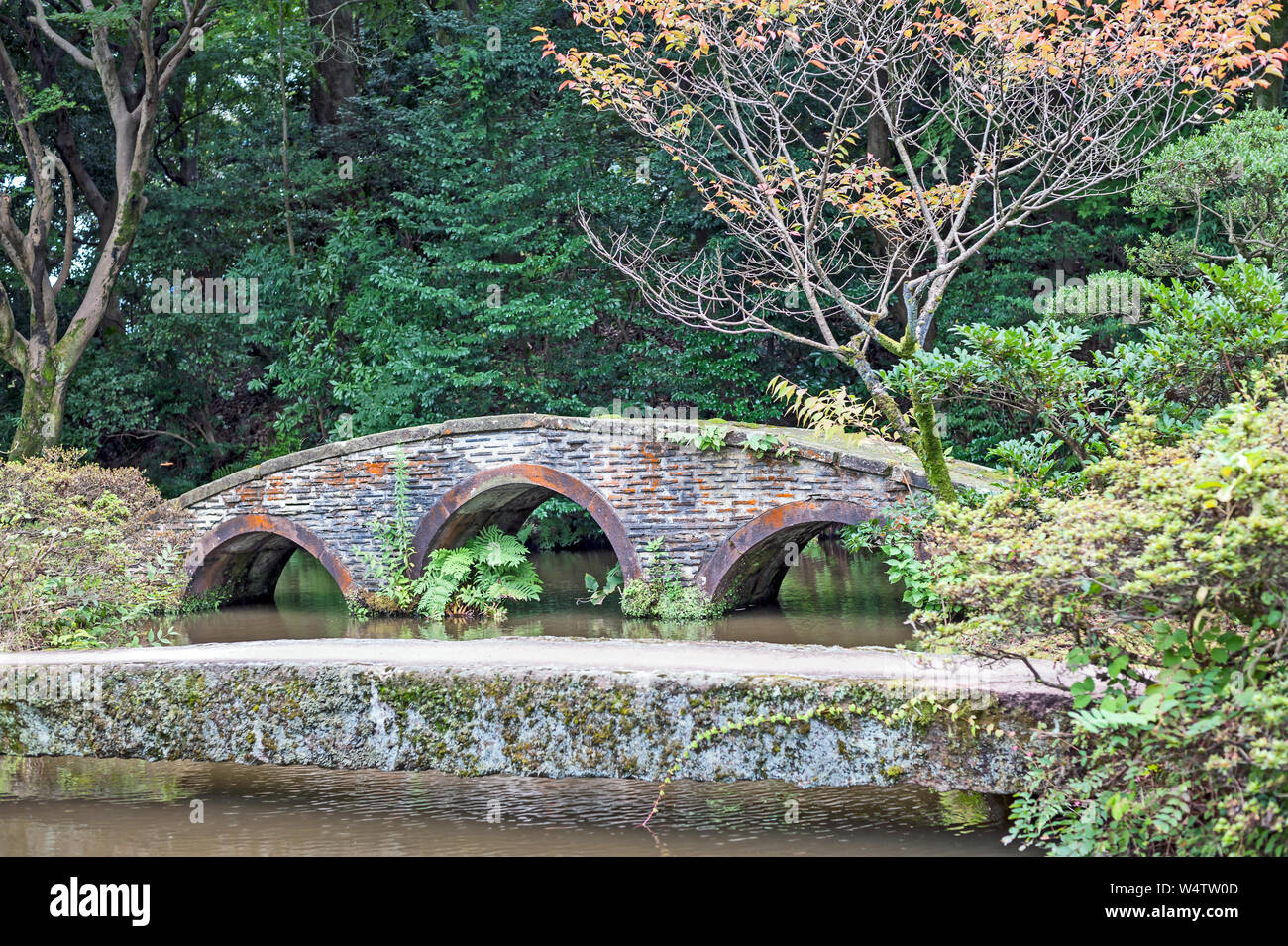 Two bridges over lake in the grounds of Oyama Shrine, Kanazawa, Japan ...