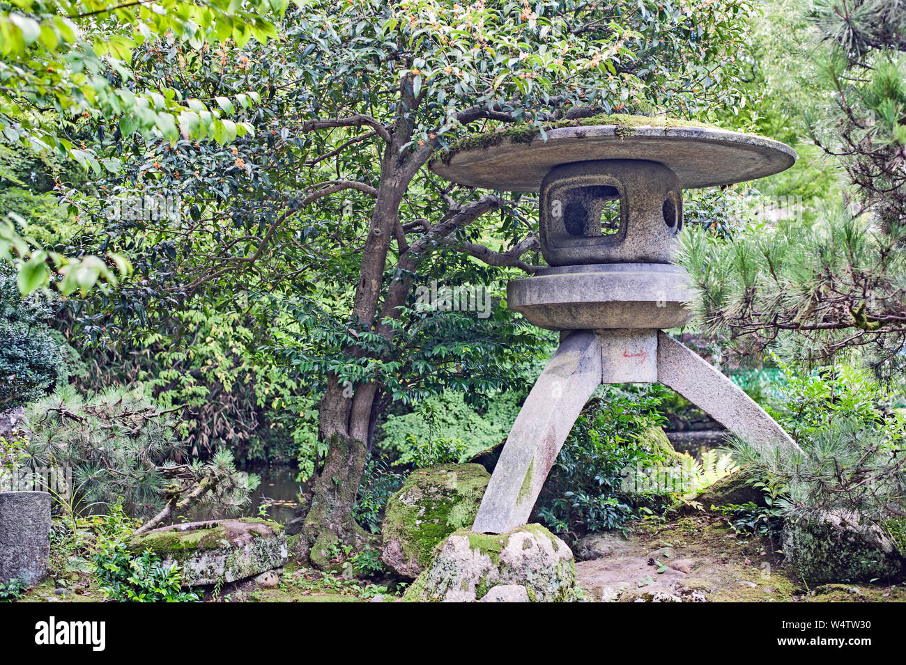 Japanese stone lantern in the grounds of Oyama Shrine, Kanazawa, Japan ...