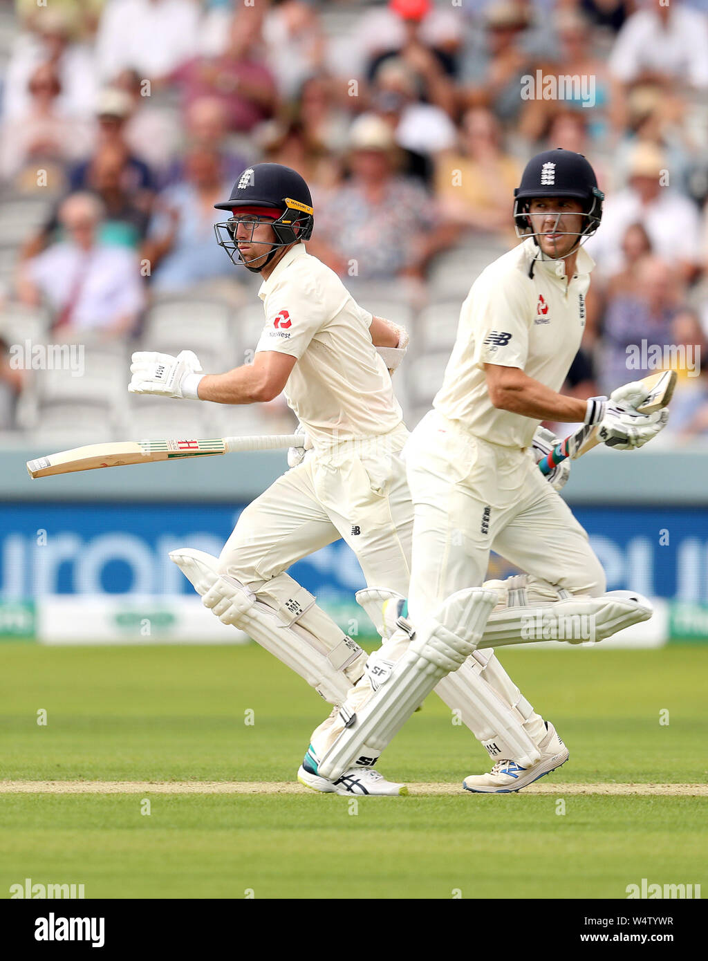 England's Jack Leach (left) and Joe Denly (right) run during day two of ...