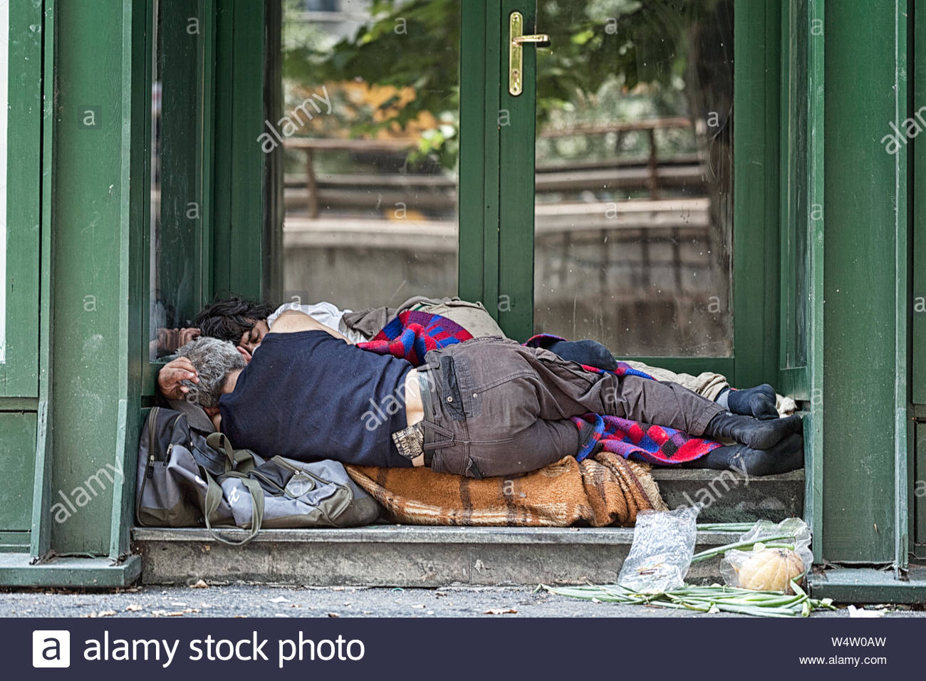 Couple Sleeping In The Street High Resolution Stock Photography and ...