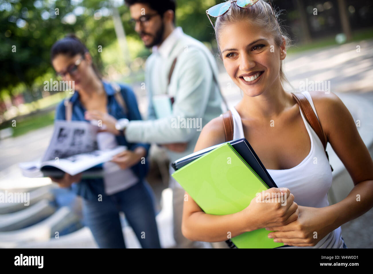 Group of friends studying together at university campus Stock Photo - Alamy