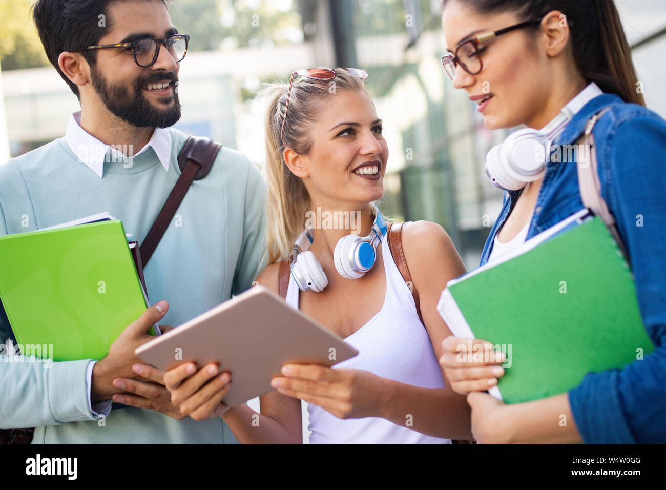 Group of friends studying together at university campus Stock Photo - Alamy