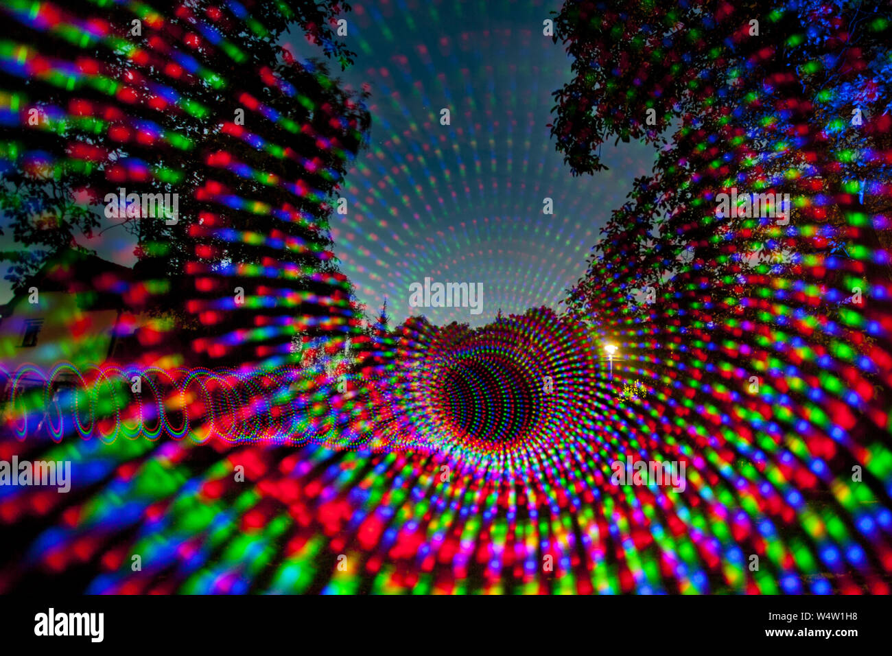 Light painting / light drawing spining colorful circle Stock Photo - Alamy