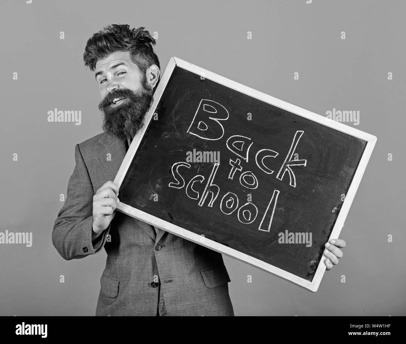 Teacher or school principal welcomes back to school. Are you ready ...