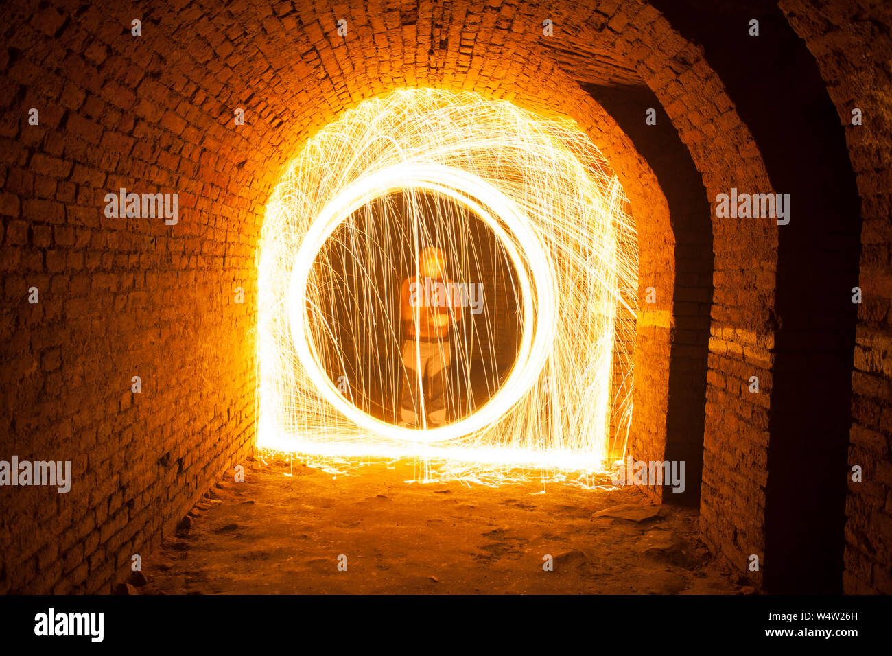 Light painting / light drawing with fire and steel wool underground ...
