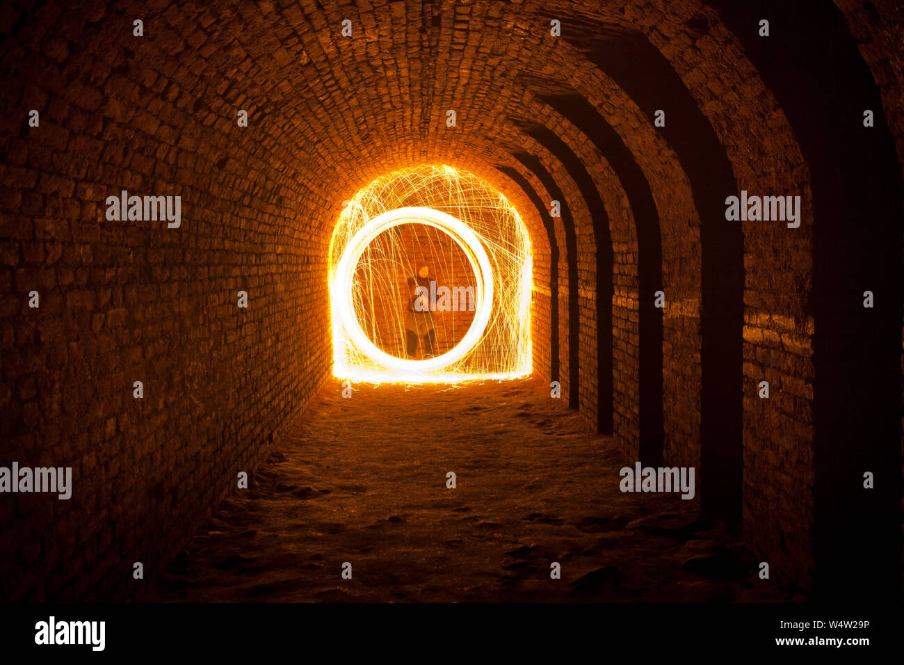 Light painting / light drawing with fire and steel wool underground ...