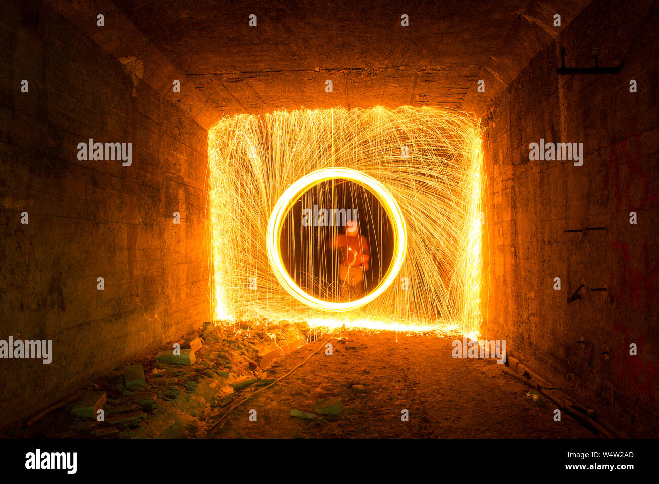 Light painting / light drawing with fire and steel wool underground ...