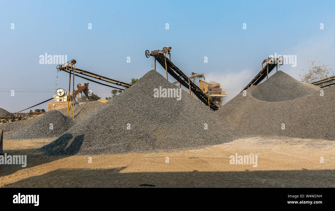 Industrial extraction of stone machine working in the stone mine with ...