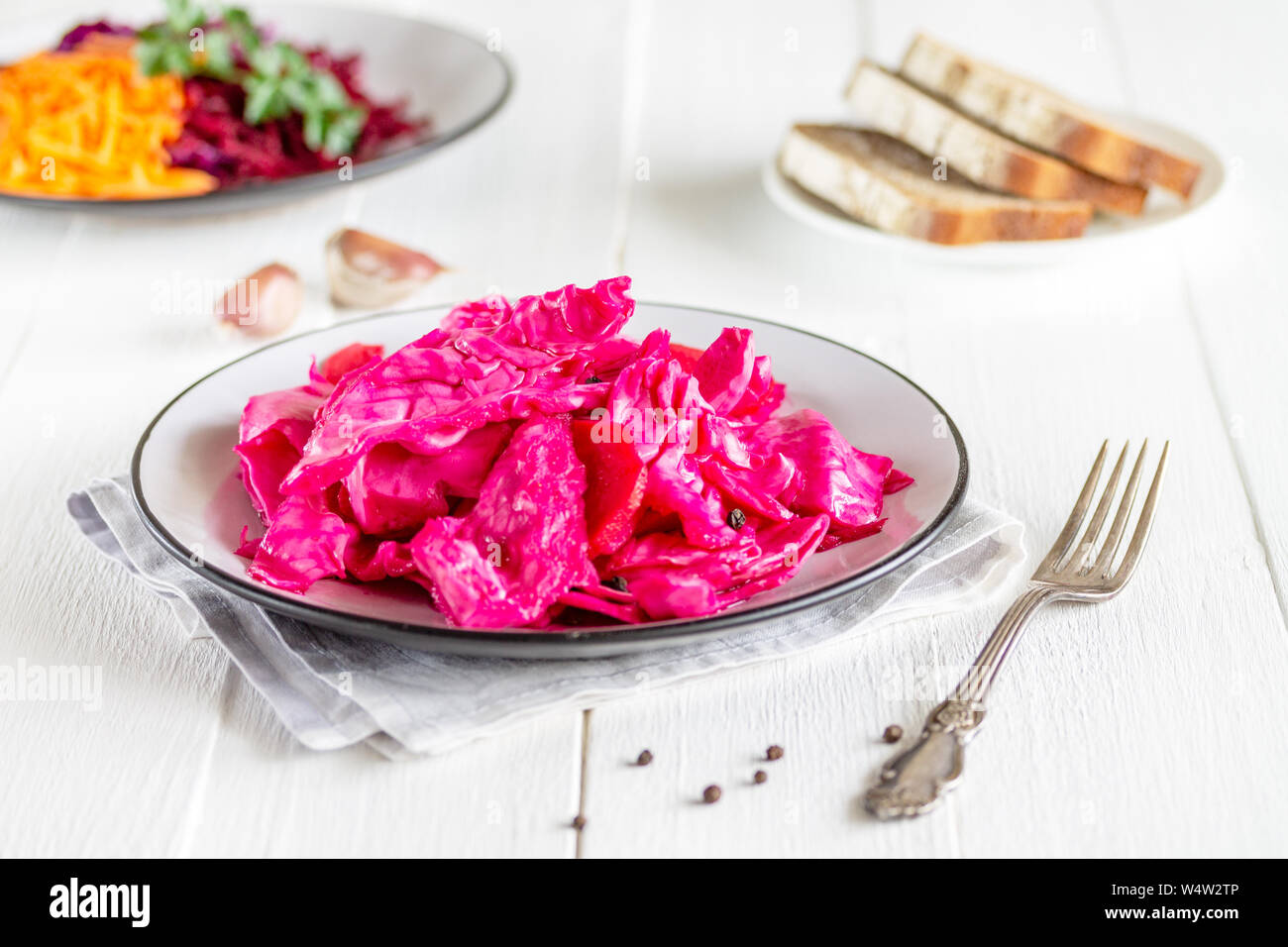 Canned fermented purple cabbage with beets, carrots and garlic on a ...