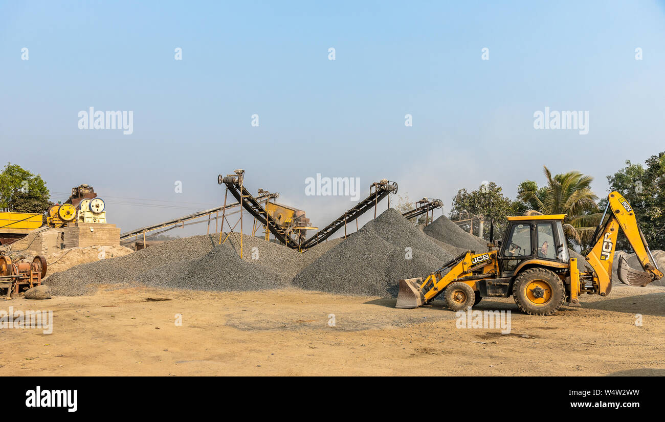 Industrial extraction of stone machine working in the stone mine with ...