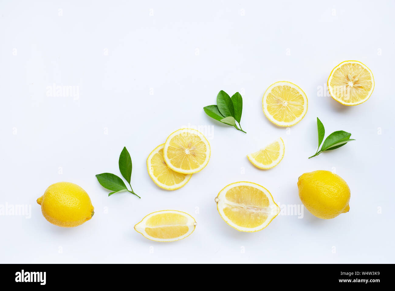 lemon and slices with leaves isolated on white background Stock Photo ...