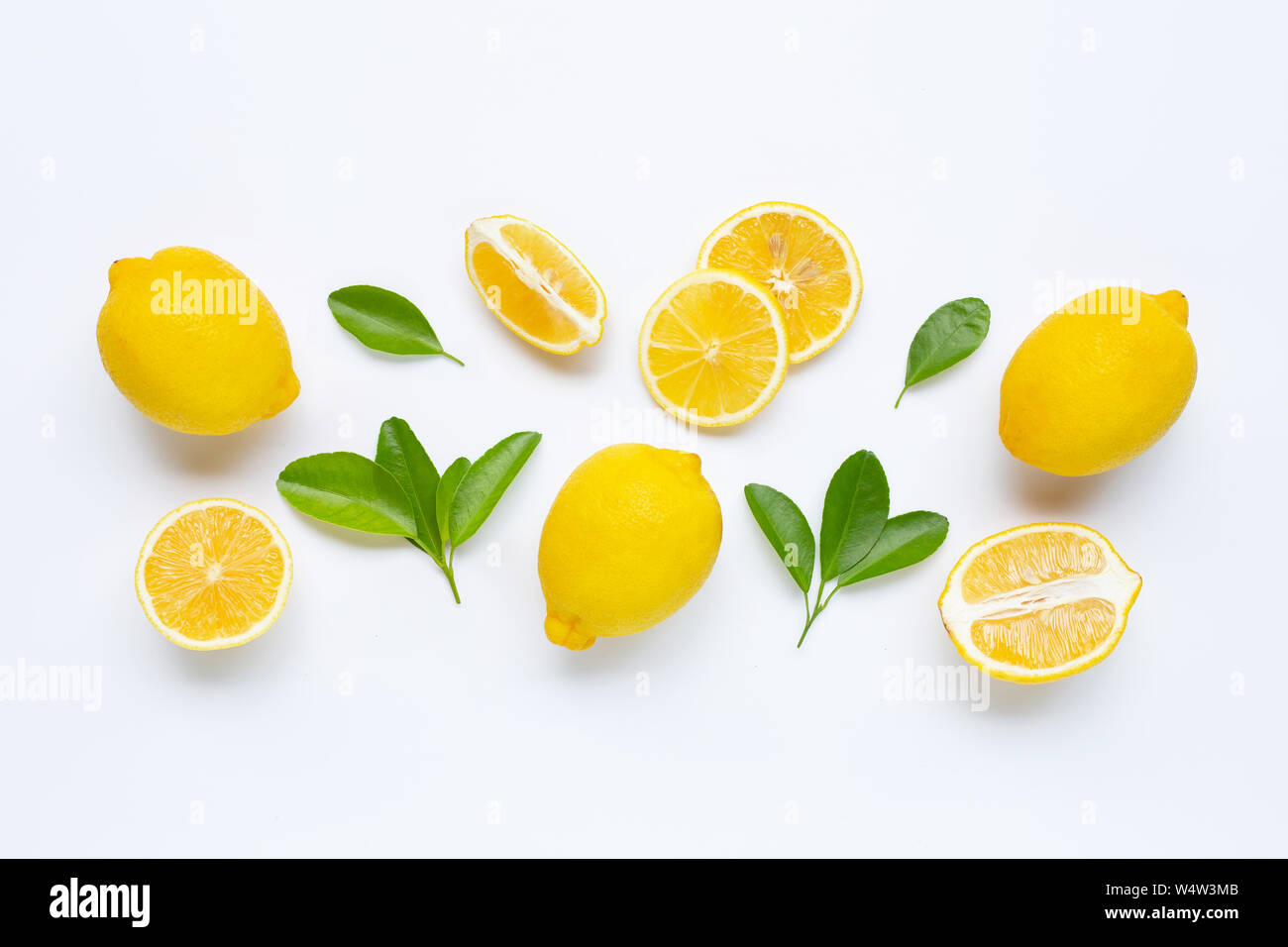 lemon and slices with leaves isolated on white background Stock Photo ...