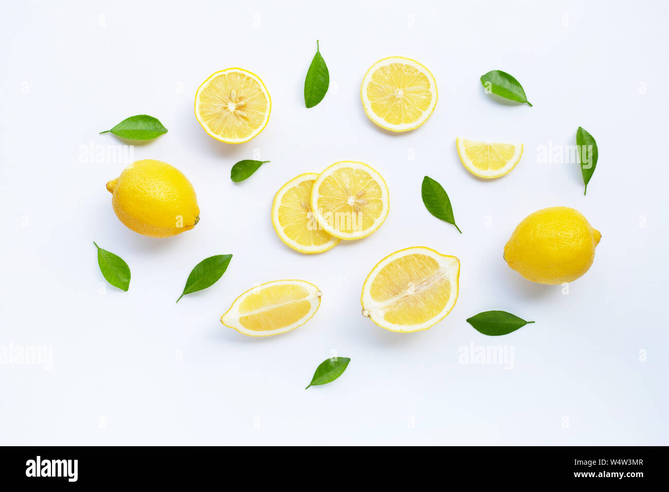 lemon and slices with leaves isolated on white background Stock Photo ...