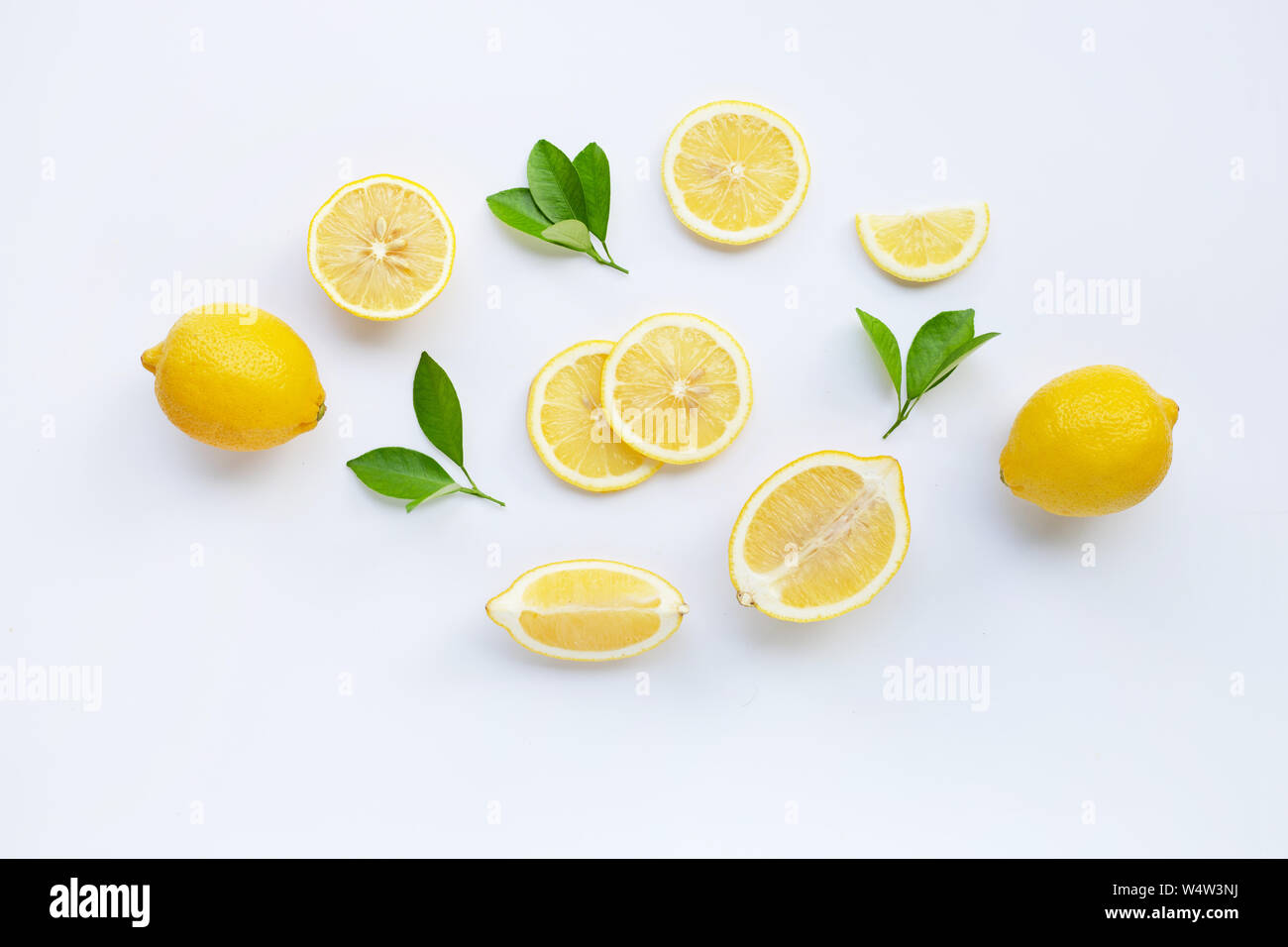 lemon and slices with leaves isolated on white background Stock Photo ...