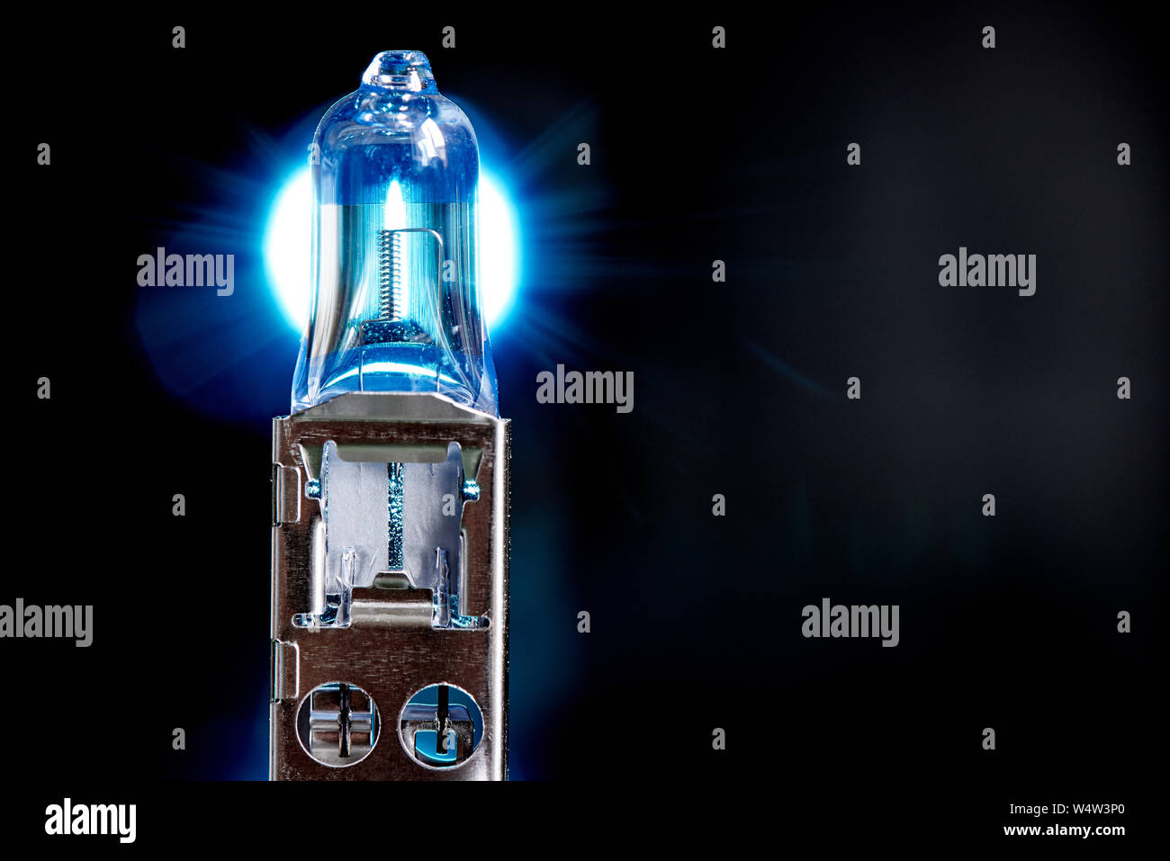 Spare light bulb for a car's headlights on black background.Сopy space ...