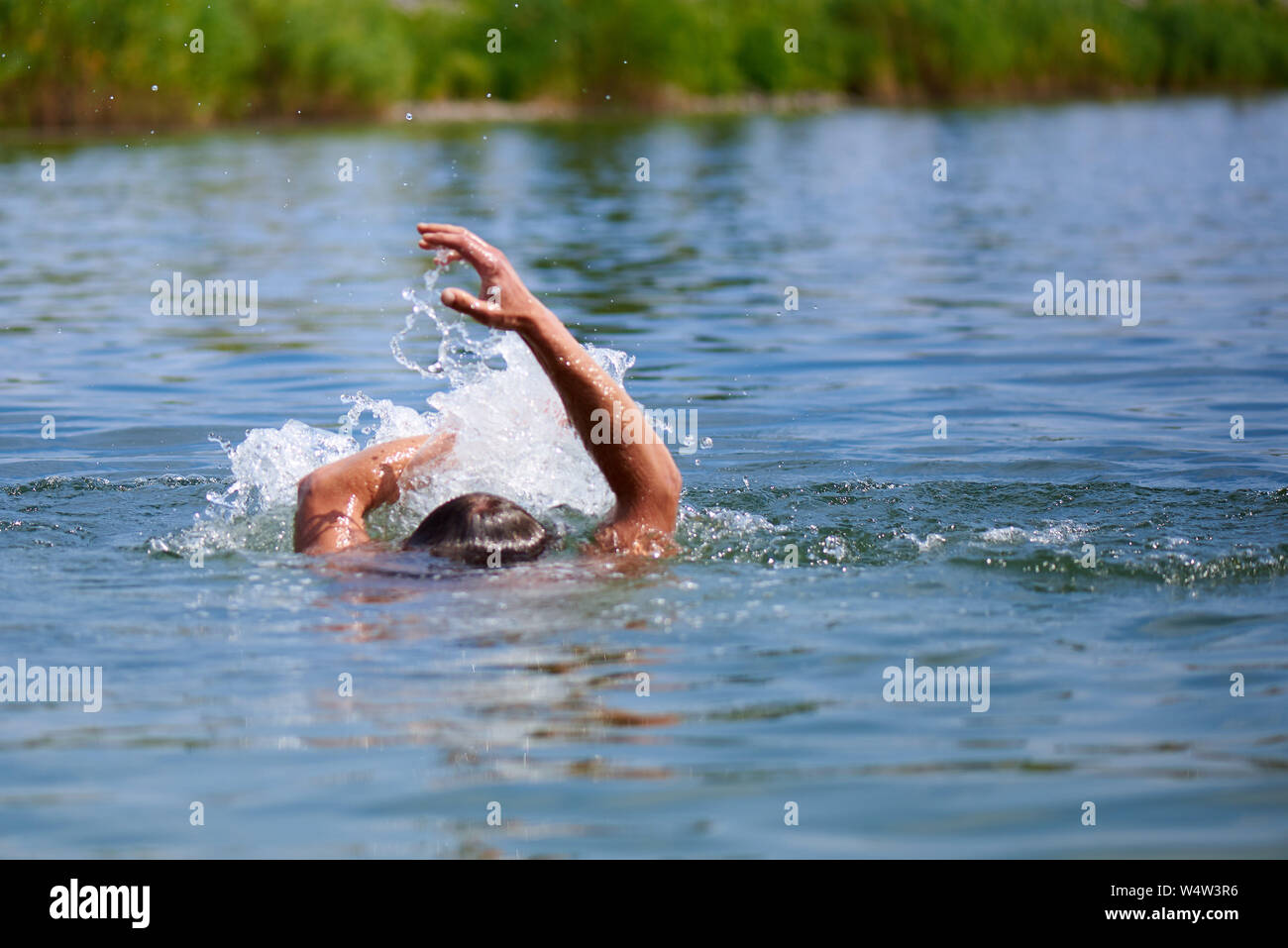 Drowning river hands hi-res stock photography and images - Alamy