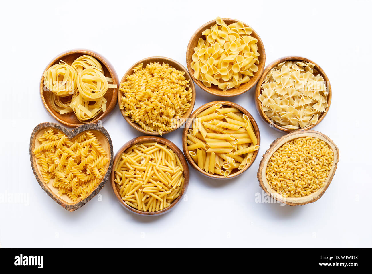 Different types of dry pasta on white background Stock Photo - Alamy