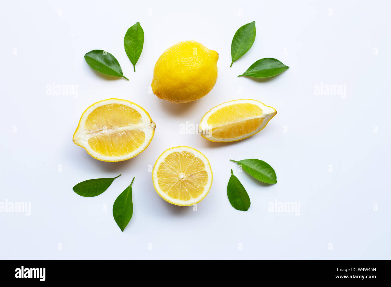 lemon and slices with leaves isolated on white background Stock Photo ...