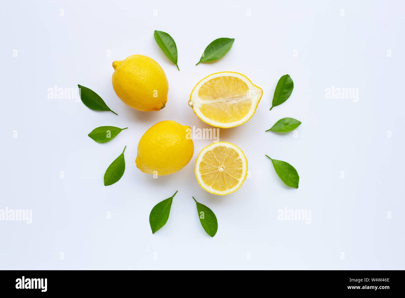 lemon and slices with leaves isolated on white background Stock Photo ...