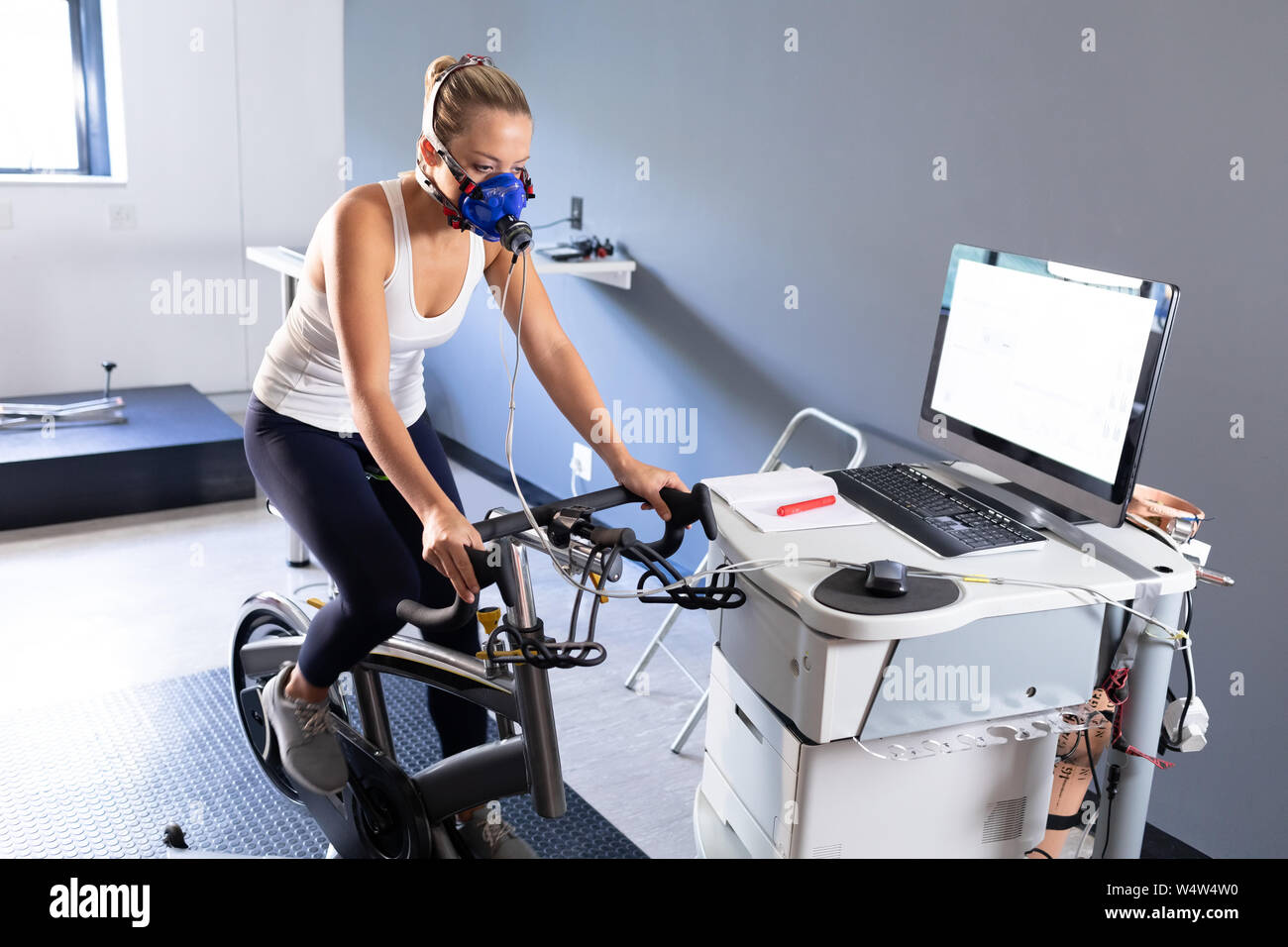 Woman doing a fitness test Stock Photo - Alamy