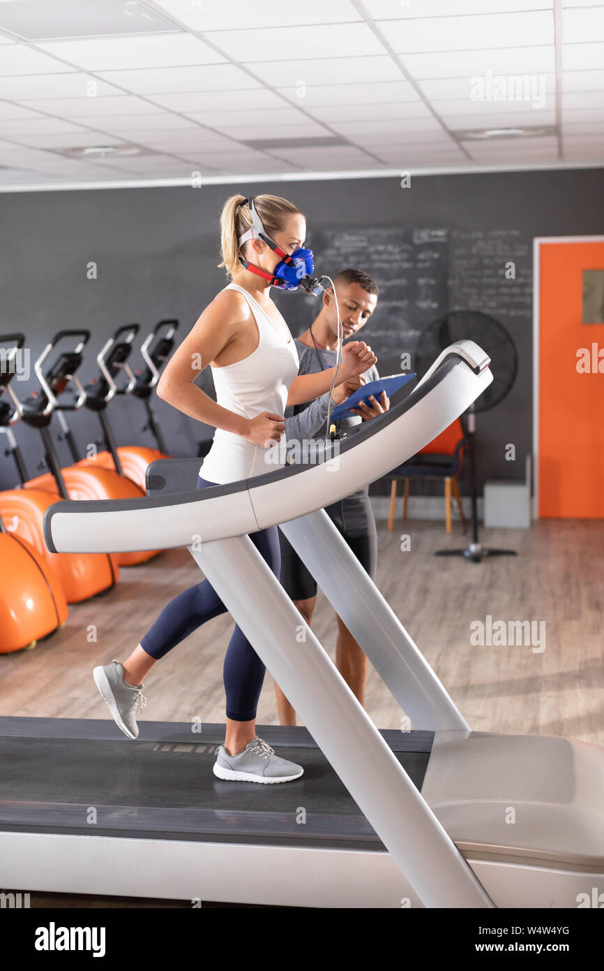 Woman doing a fitness test Stock Photo - Alamy