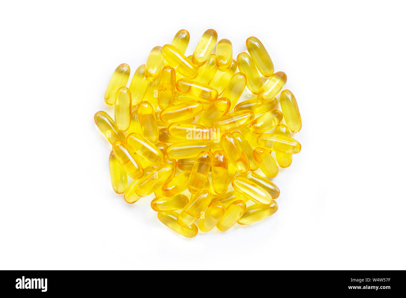Fish oil capsules on white background Stock Photo - Alamy